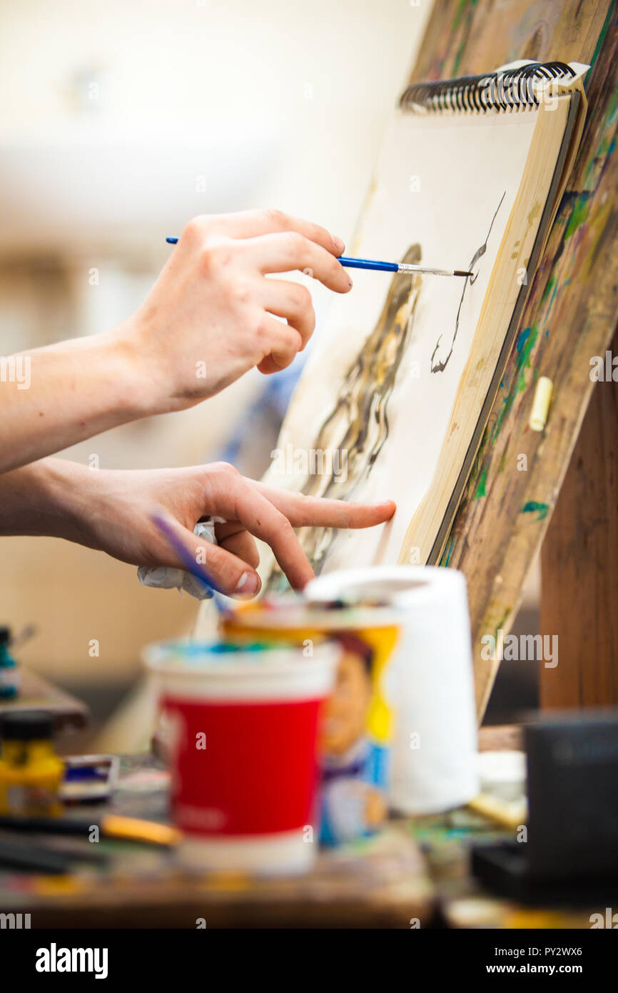 Hands drawing, school scene Stock Photo - Alamy