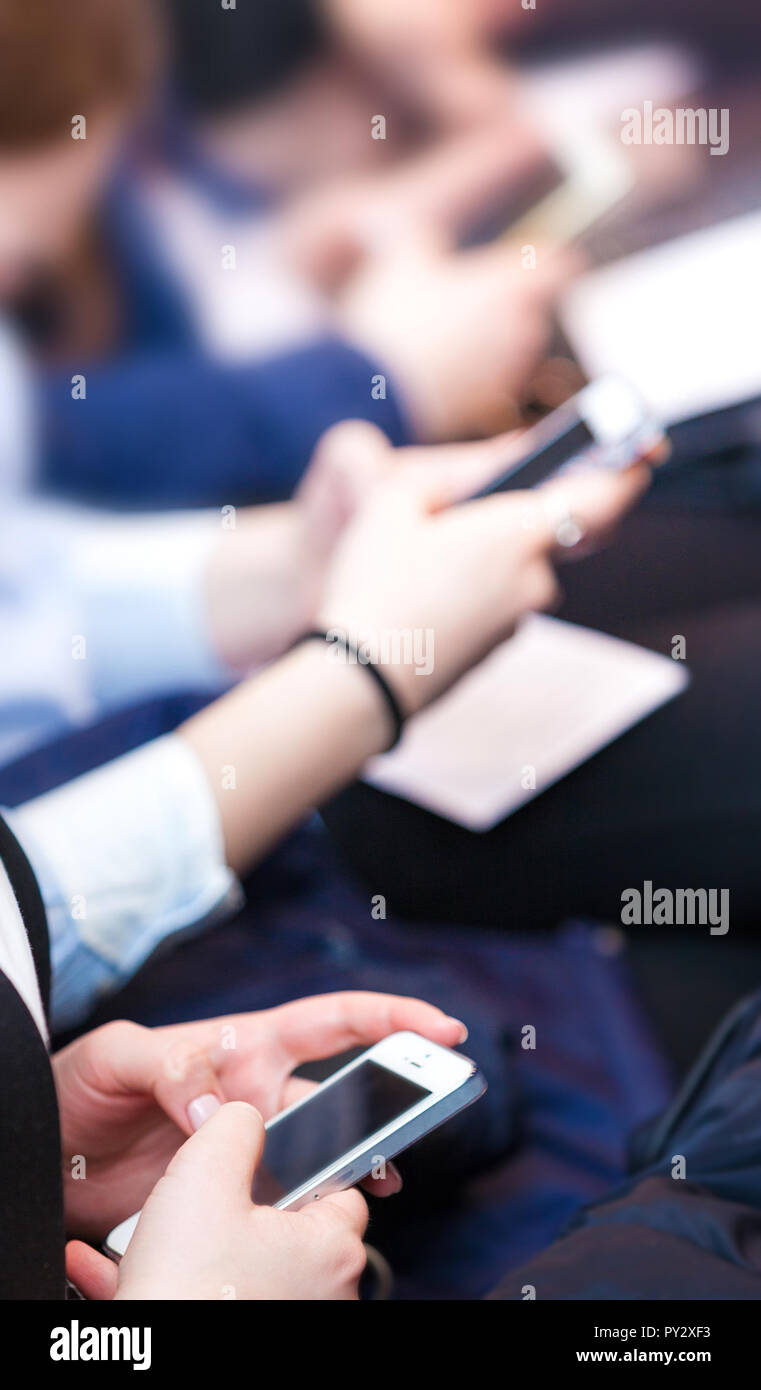 Using mobile phones in class Stock Photo - Alamy