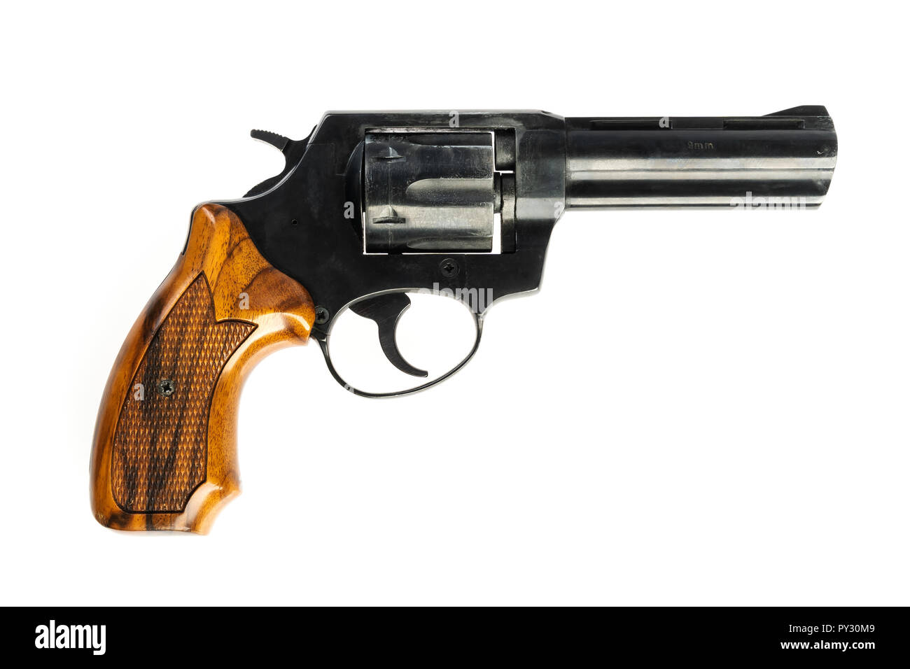 isolated used old black revolver on a white background Stock Photo - Alamy