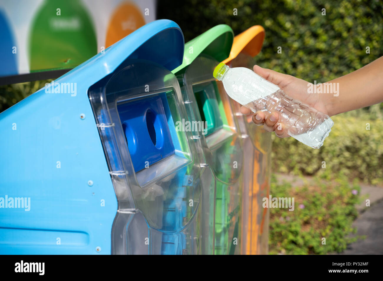 man hand putting plastic reuse for recycling concept environmental ...