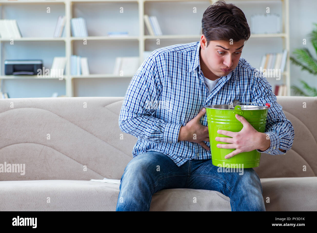 Sick man suffering at home from infection and bad stomach Stock Photo ...