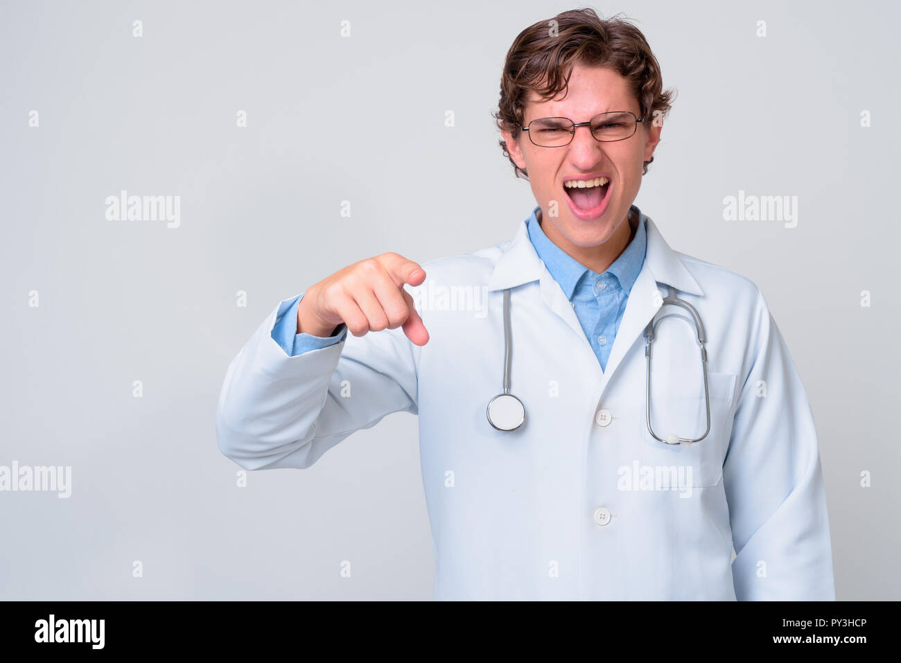 Angry pointing doctor young man hi-res stock photography and images - Alamy