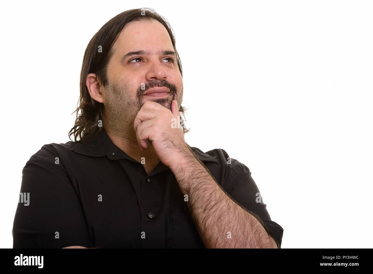 Fat Caucasian man thinking with hand on chin Stock Photo - Alamy