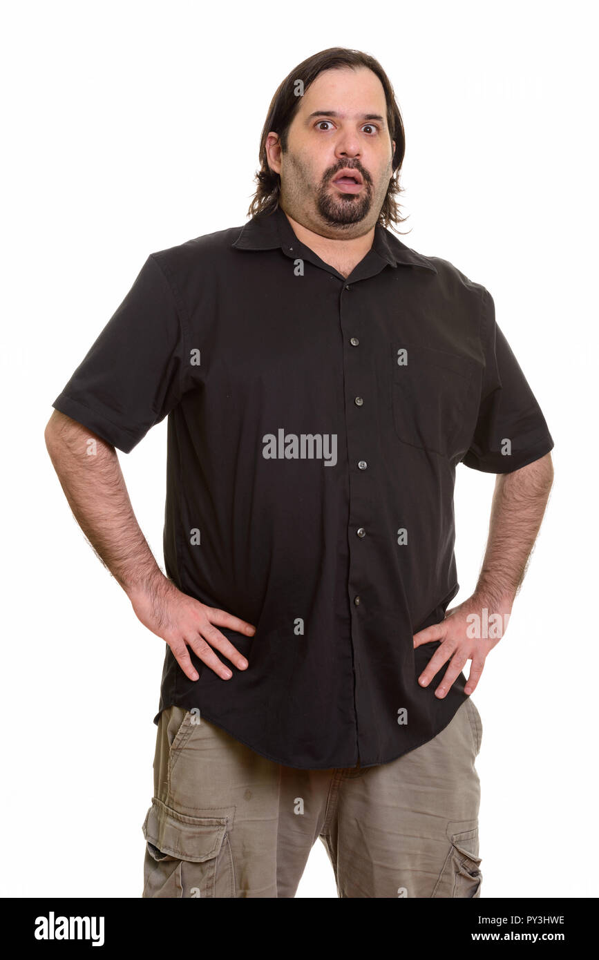 Fat Caucasian man looking shocked and looking at camera Stock Photo - Alamy