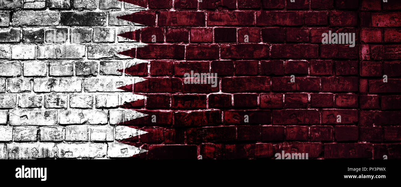 National flag of Qatar on a brick background. Concept image for Qatar ...