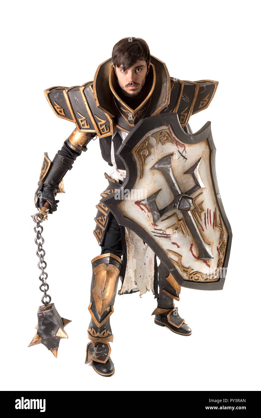 Young man cosplaying with fantasy knight costume Stock Photo - Alamy