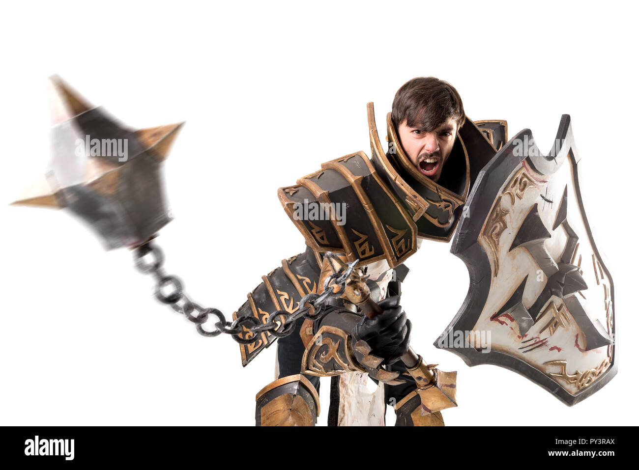 Young man cosplaying with fantasy knight costume Stock Photo - Alamy