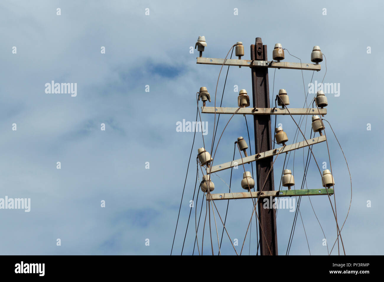 Antique telephone pole in India Stock Photo - Alamy