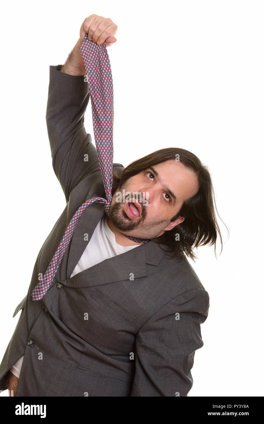 Business man pulling tie hi-res stock photography and images - Alamy