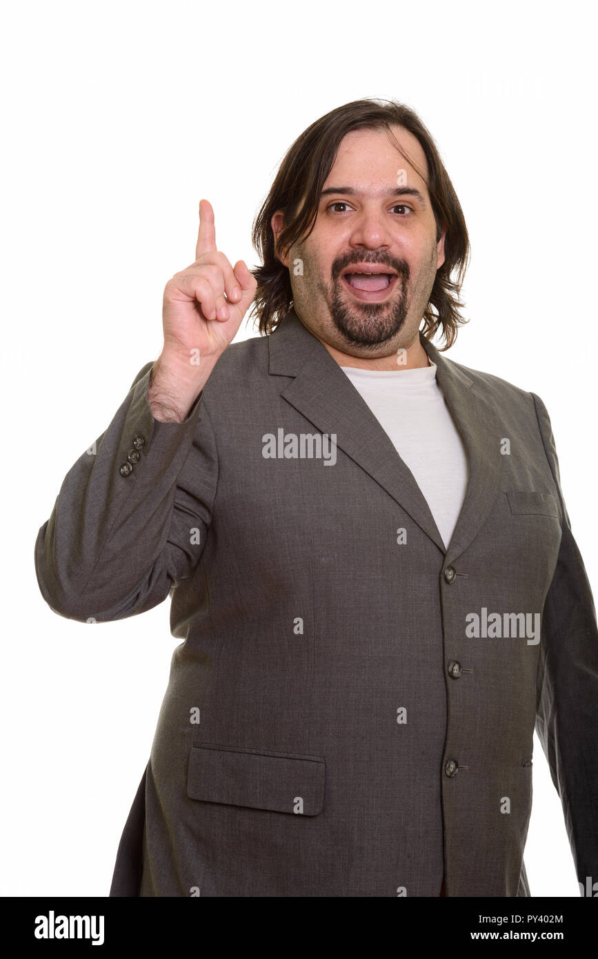 Happy fat Caucasian businessman smiling and pointing finger up Stock ...