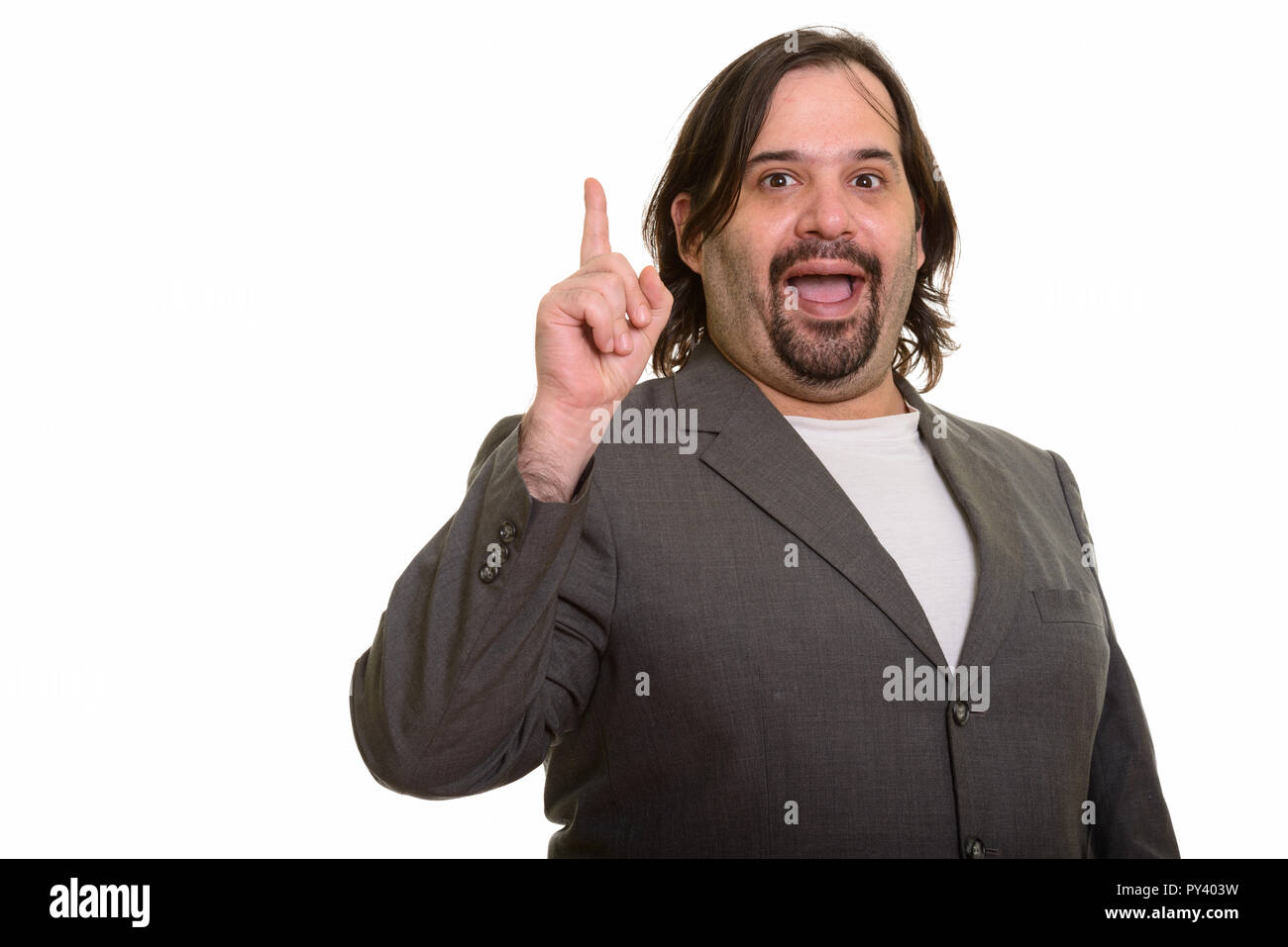 Happy fat Caucasian businessman smiling and pointing finger up Stock ...