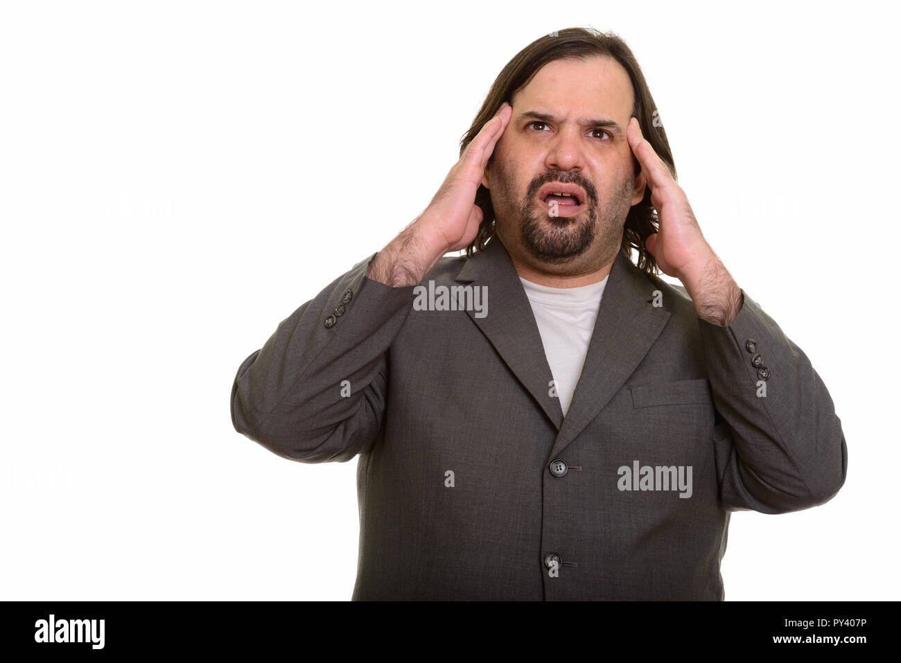 Portrait of stressed fat businessman having headache Stock Photo - Alamy