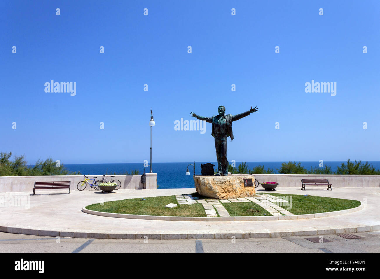Italy, Apulia, Polignano a Mare, Domenico Modugno statue Stock Photo ...