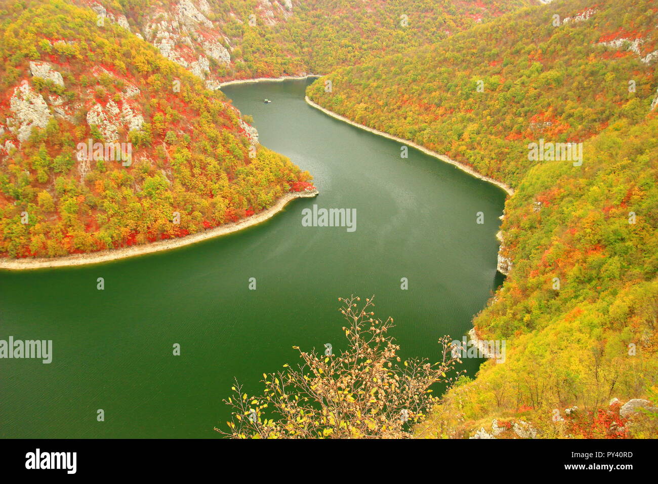 Fall landscape with river and colorful forest Stock Photo - Alamy