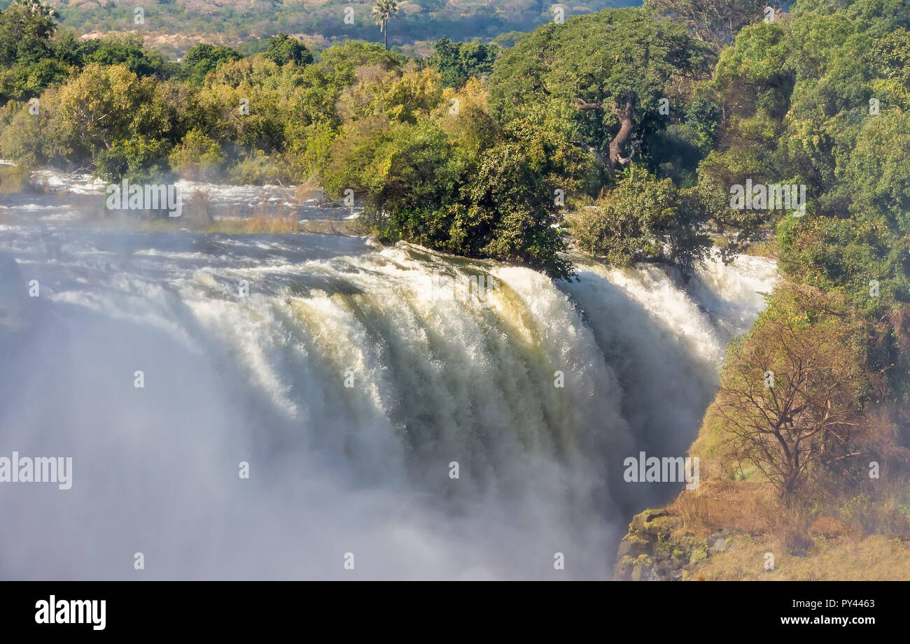 Victoria falls after rain season in May, waterfall is full of water ...