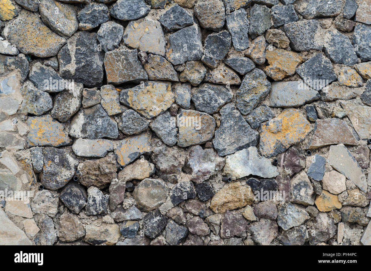 stone wall texture build from stone plates Stock Photo - Alamy