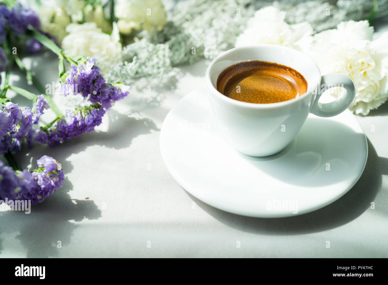 espresso coffee and flower in morning Stock Photo - Alamy