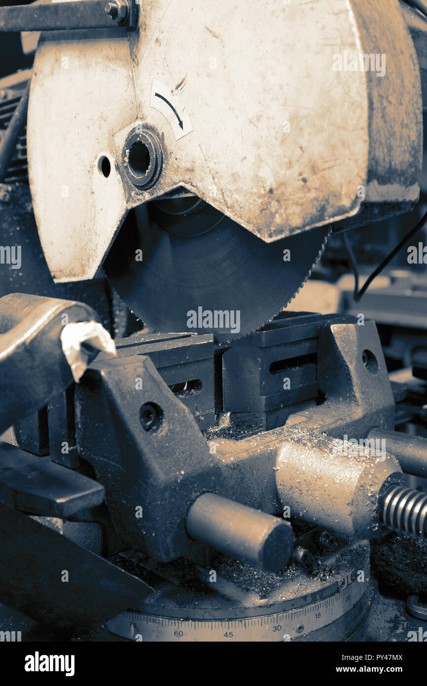 Industrial circular saw machine in a factory workshop with toning Stock ...