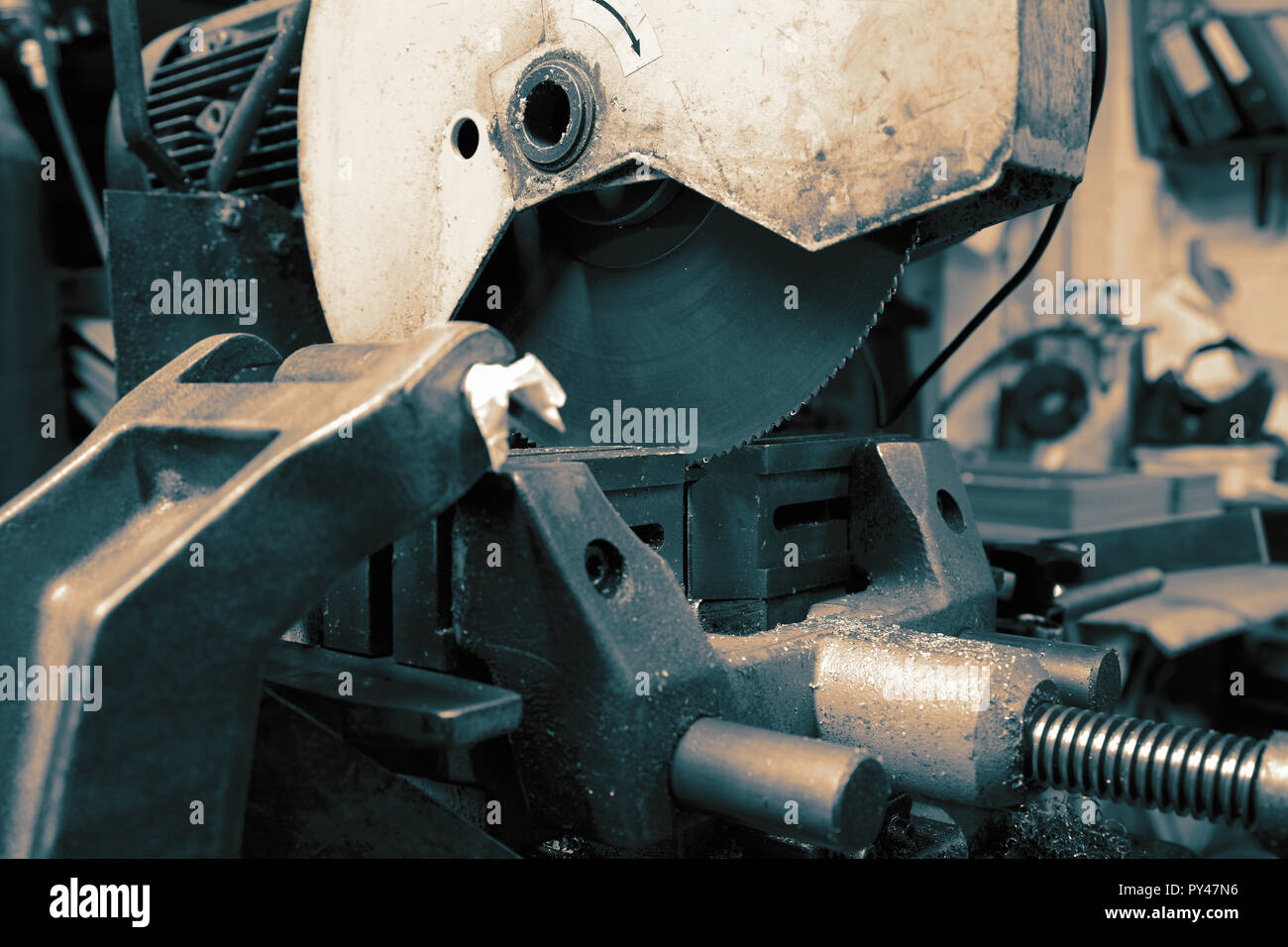 Industrial circular saw machine in a factory workshop with toning Stock ...