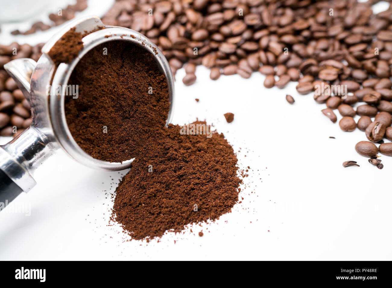 coffee ground powder and coffee beans Stock Photo - Alamy