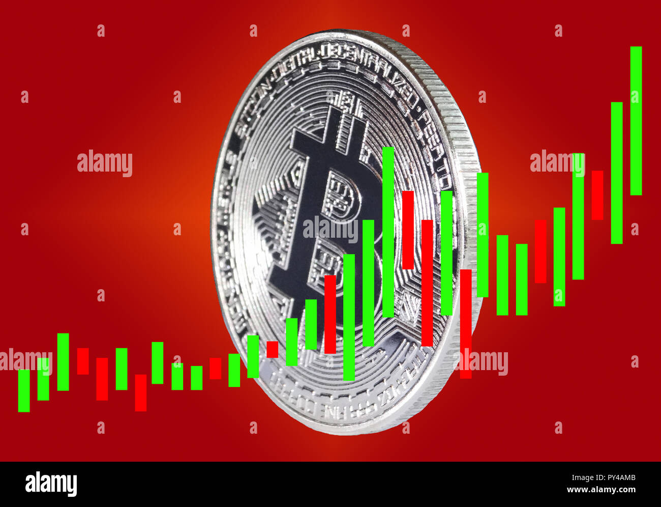 Bitcoin crypto currency silver coin with trading chart Stock Photo - Alamy