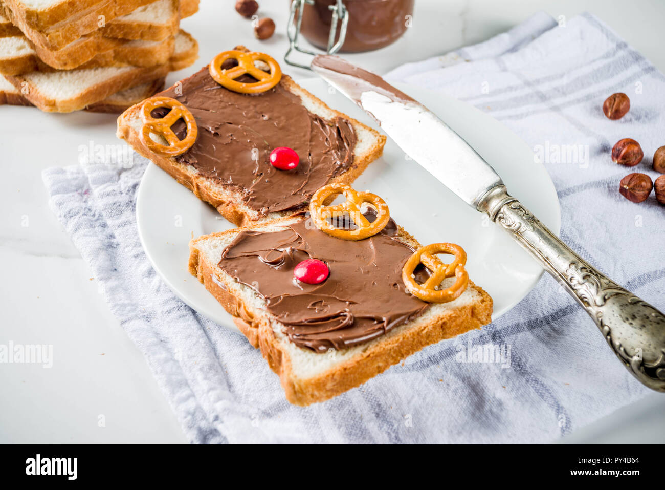 Chocolate and hazelnut spread sandwiches with white toasted bread ...