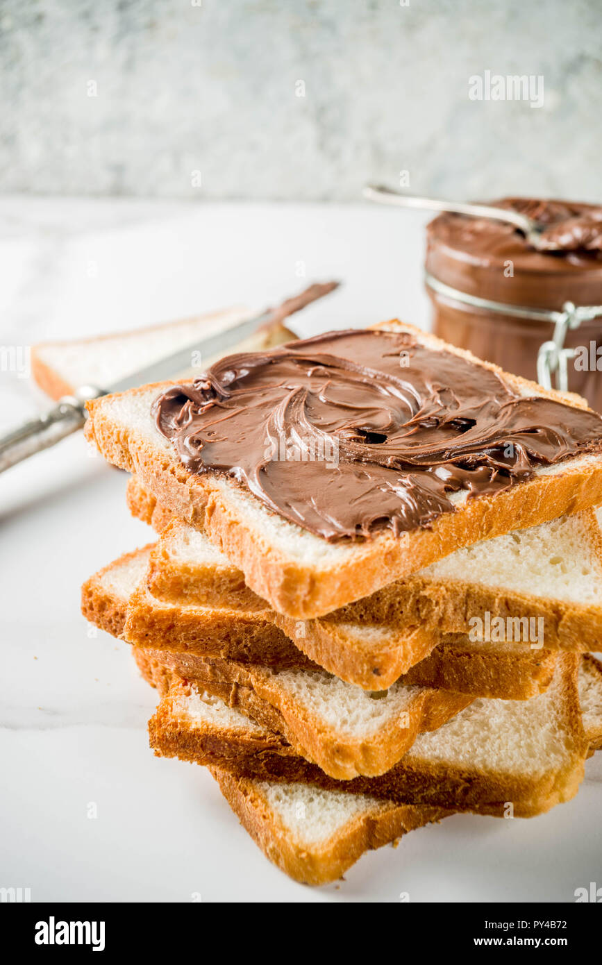 Chocolate and hazelnut spread sandwiches with white toasted bread ...