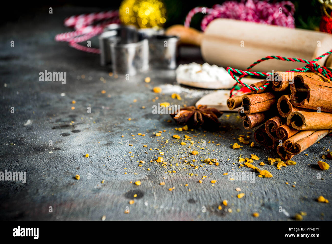 Christmas bakery background, with baking utensils, flour, spices and ...
