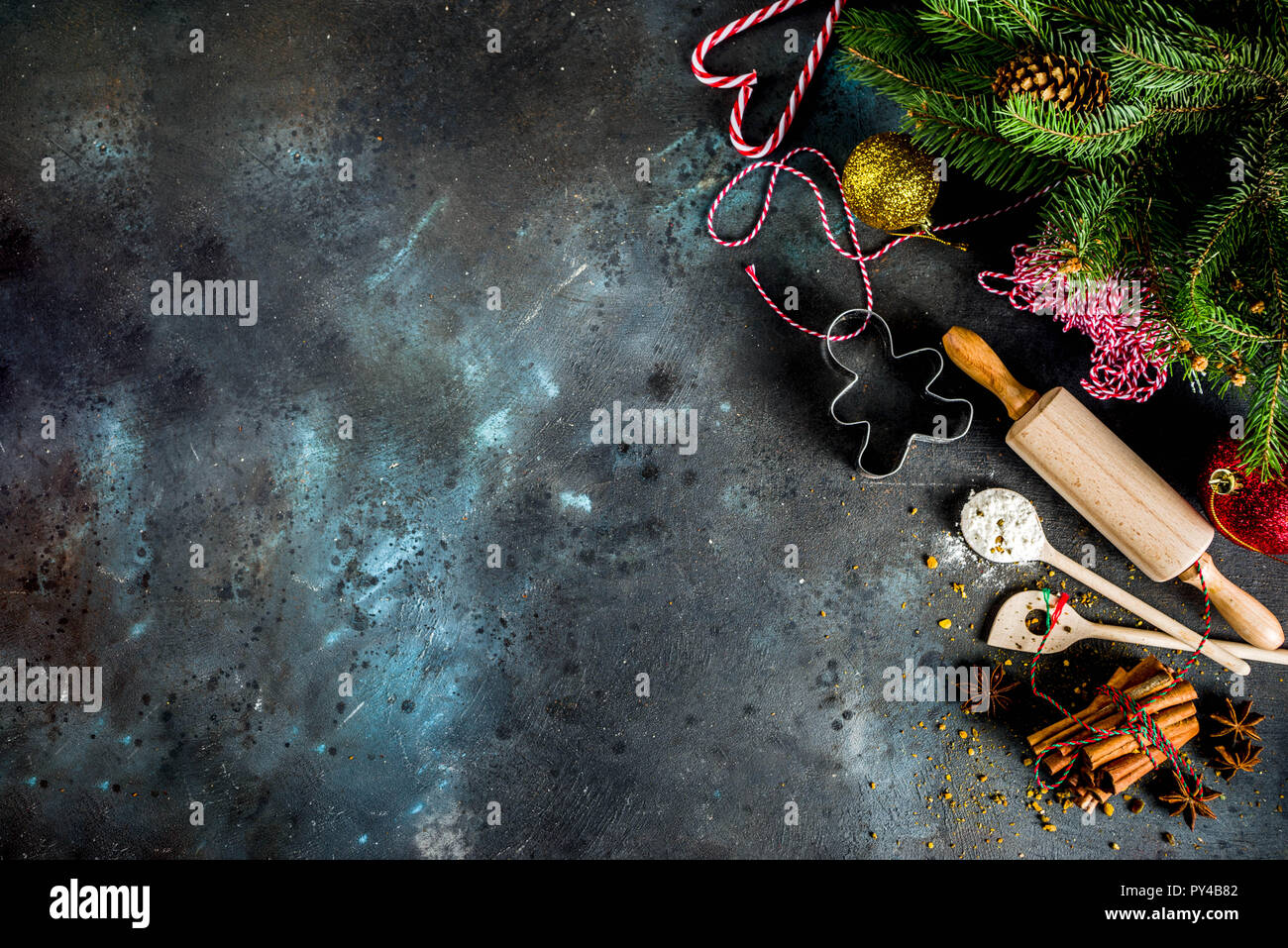 Christmas bakery background, with baking utensils, flour, spices and ...