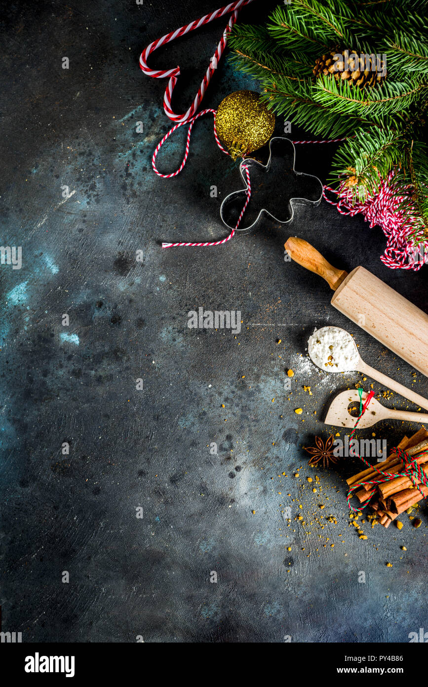 Christmas bakery background, with baking utensils, flour, spices and ...