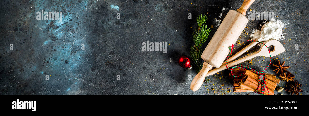 Christmas bakery background, with baking utensils, flour, spices and ...