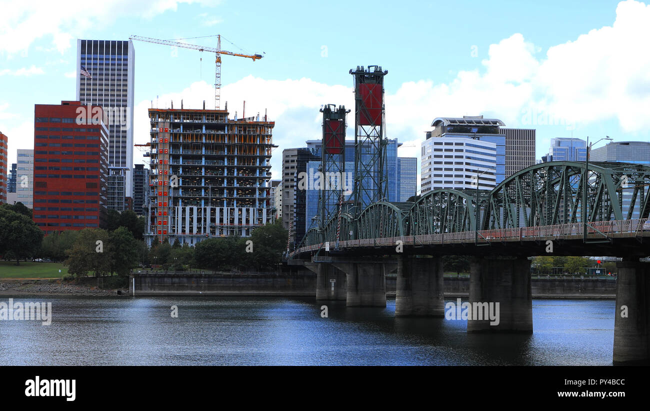 View of Portland, Oregon on a fine sunny day by a bridge Stock Photo ...