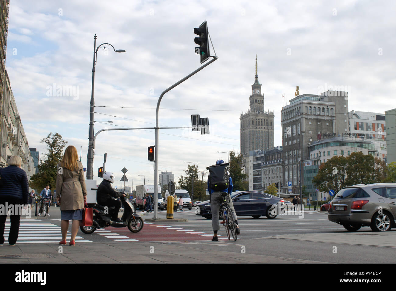 Warsaw, Poland - October 5 2018: People and vehicles at a busy road ...