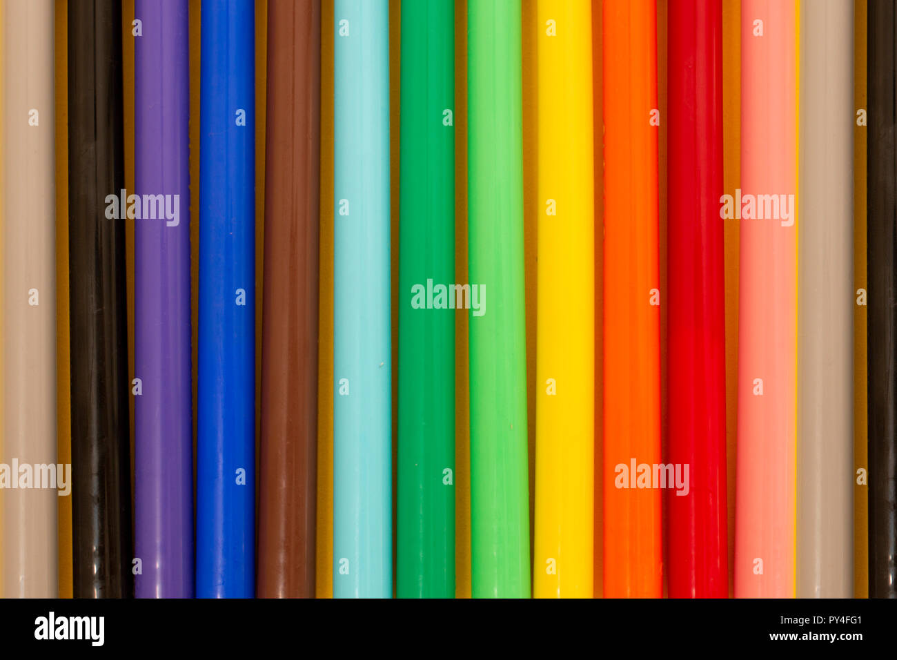 set of felt pens isolated on a yellow background Stock Photo - Alamy