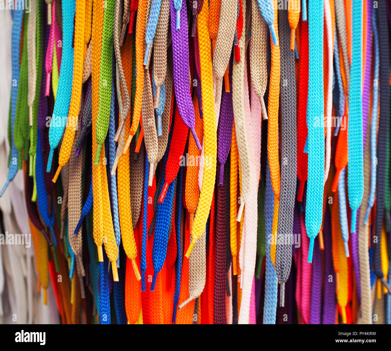 Rainbow colored shoelaces hi-res stock photography and images - Alamy