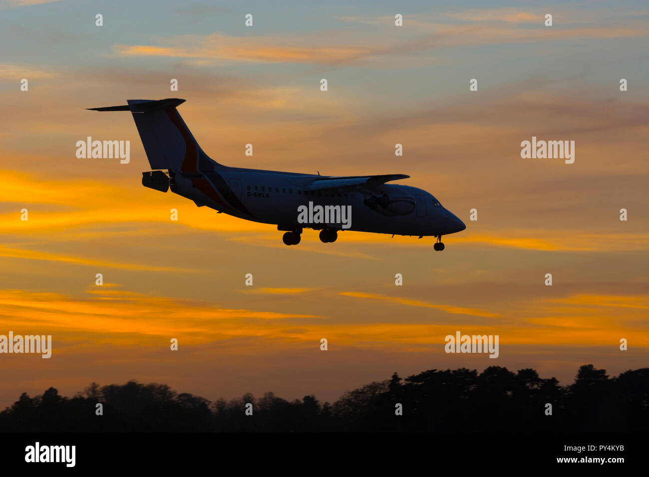 Jota Aviation Bae 146 landing at sunset, Birmingham Airport, UK Stock ...