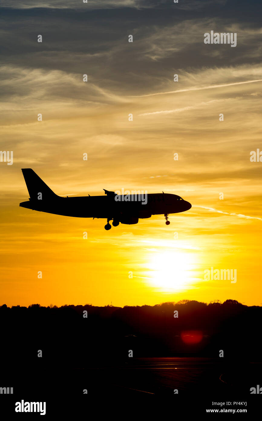 Easyjet Airbus A319 landing at sunset, Birmingham Airport, UK Stock ...