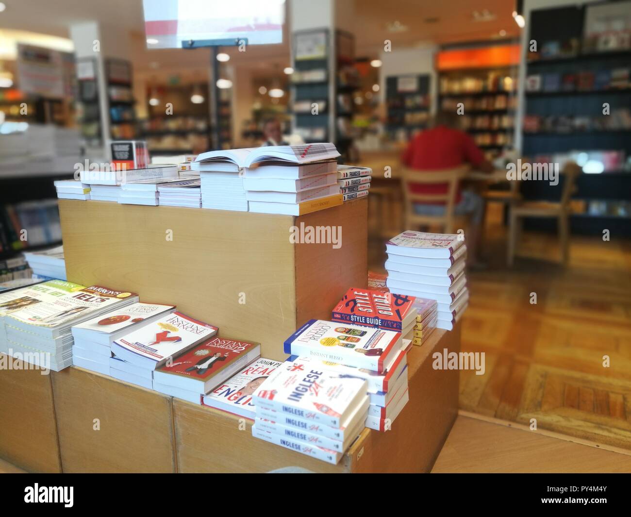 Open Book With A College Student In A Public Library Stock Photo Alamy open-book-with-a-college-student-in-a-public-library-stock-photo-alamy