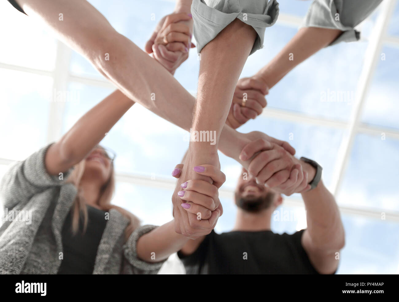 United hands on white background Stock Photo - Alamy