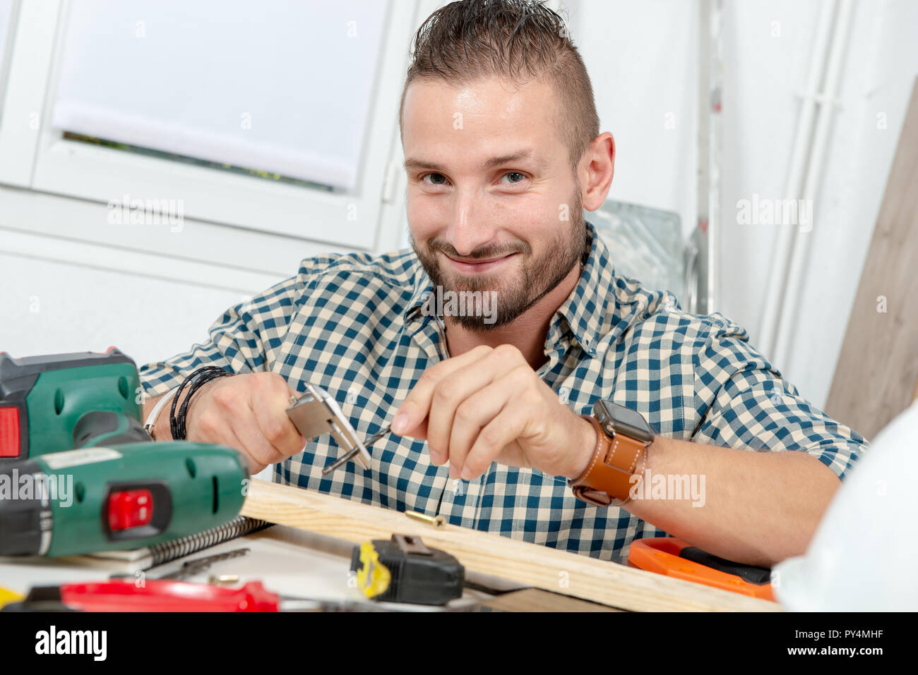 Worker using caliper measure metal hi-res stock photography and images ...