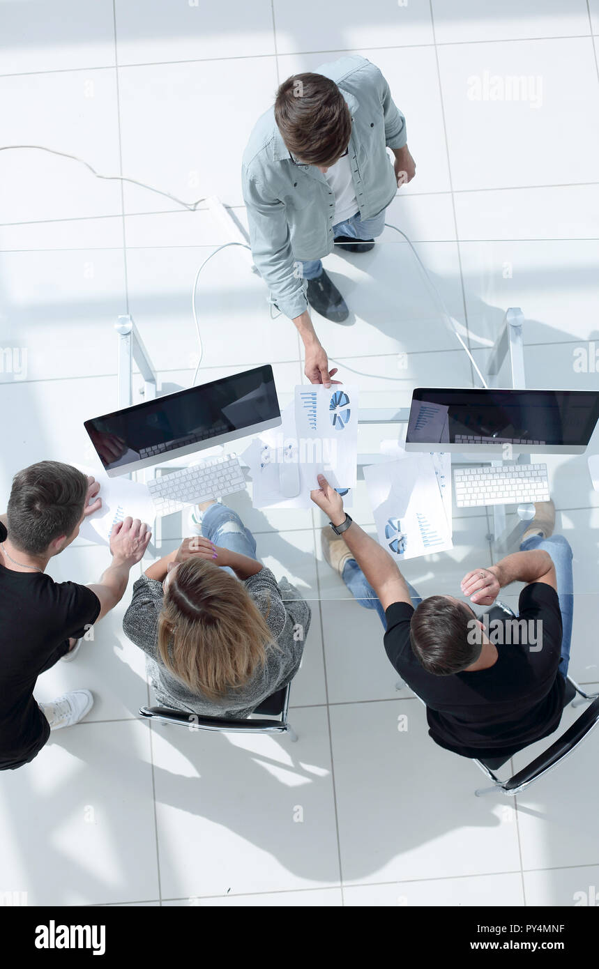 the manager gives the diagram to his management Stock Photo - Alamy
