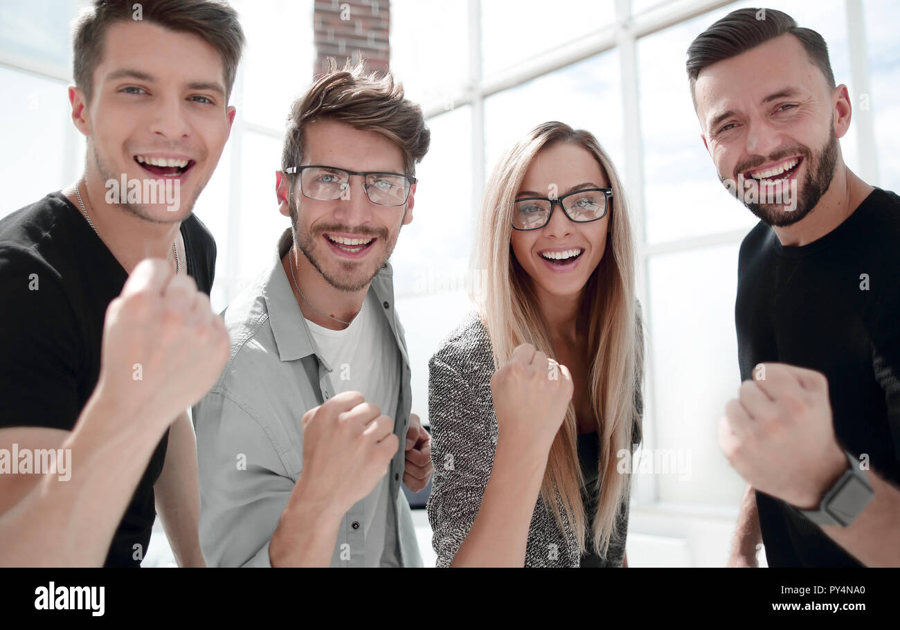 Business team celebrating a good job in the office Stock Photo - Alamy