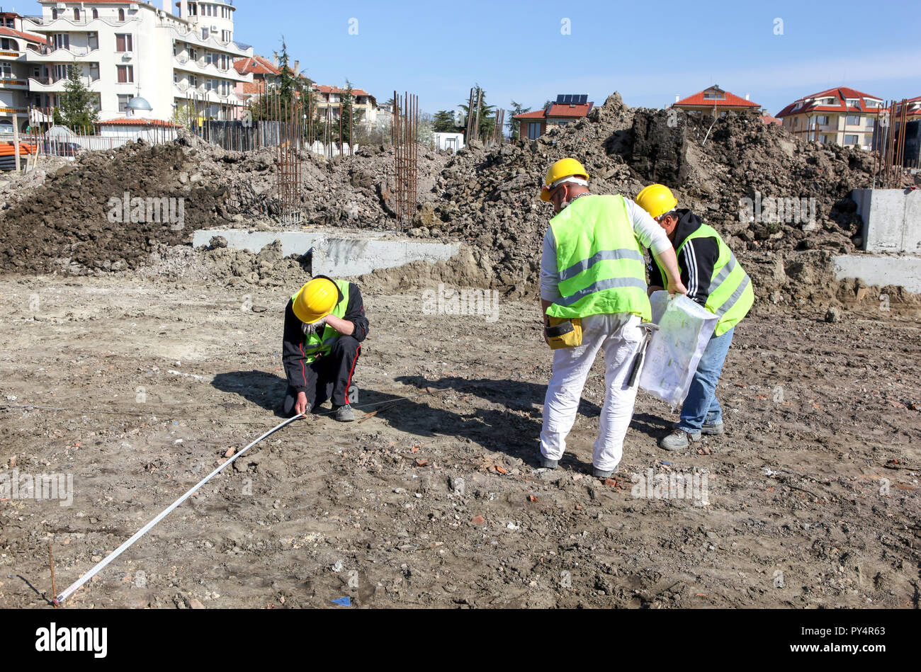 Construction worker on building site Stock Photo - Alamy