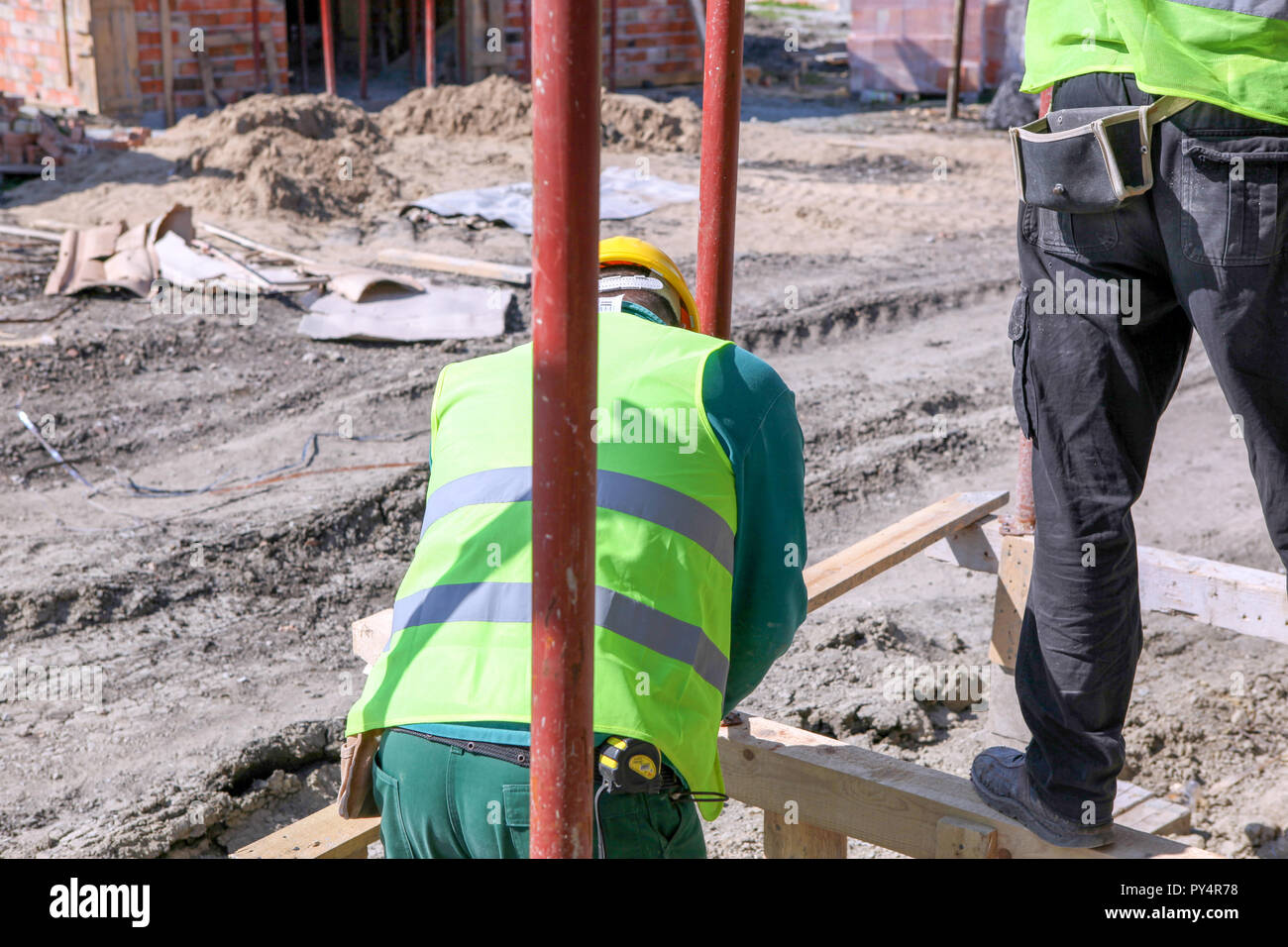 Construction worker on building site Stock Photo - Alamy