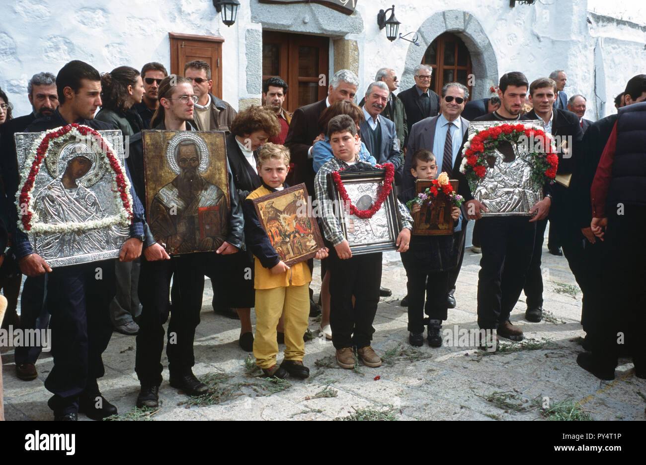 Family icons are displayed after being blessed at a special service ...