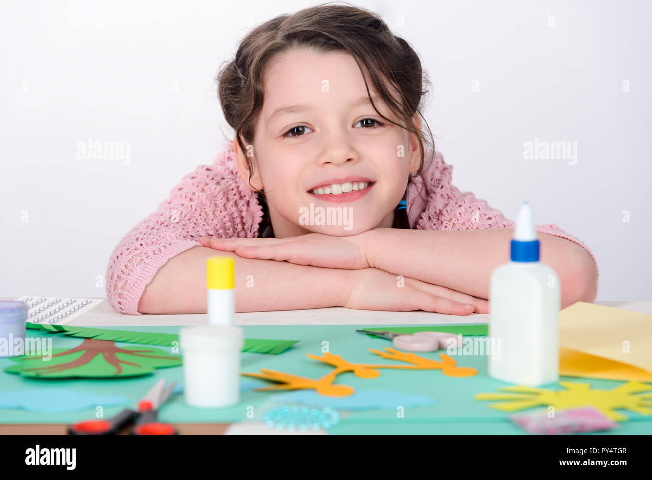 Girl and colored paper Stock Photo - Alamy