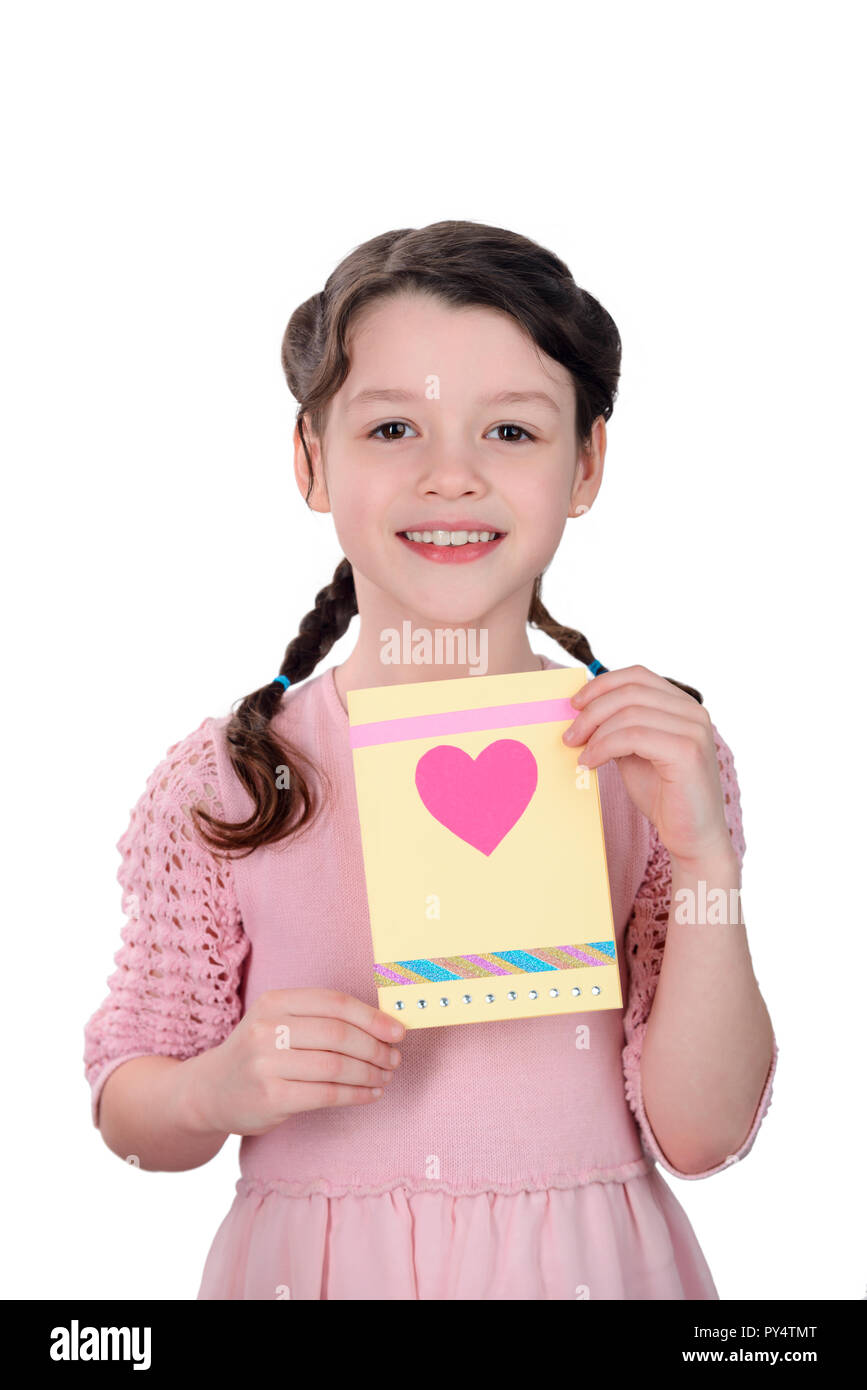 Girl showing a greeting card Stock Photo - Alamy