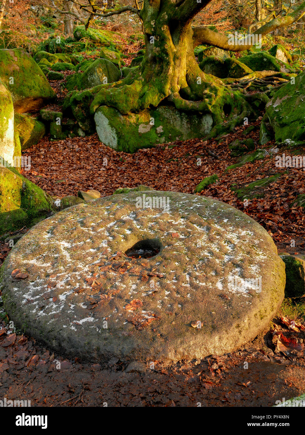Old millstone wheel in Derbyshire Peak District England Stock Photo - Alamy