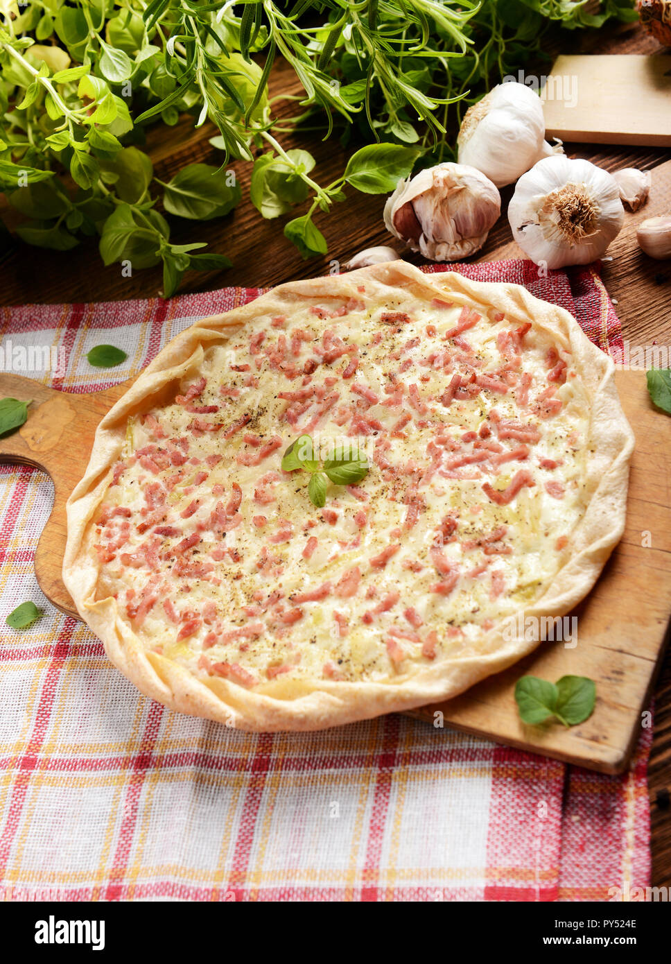 Traditional french tarte with onion and bacon Stock Photo - Alamy