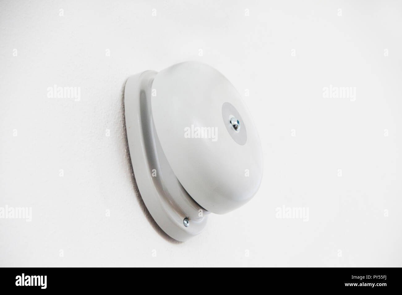 Close up view of a modern school alarm bell Stock Photo - Alamy